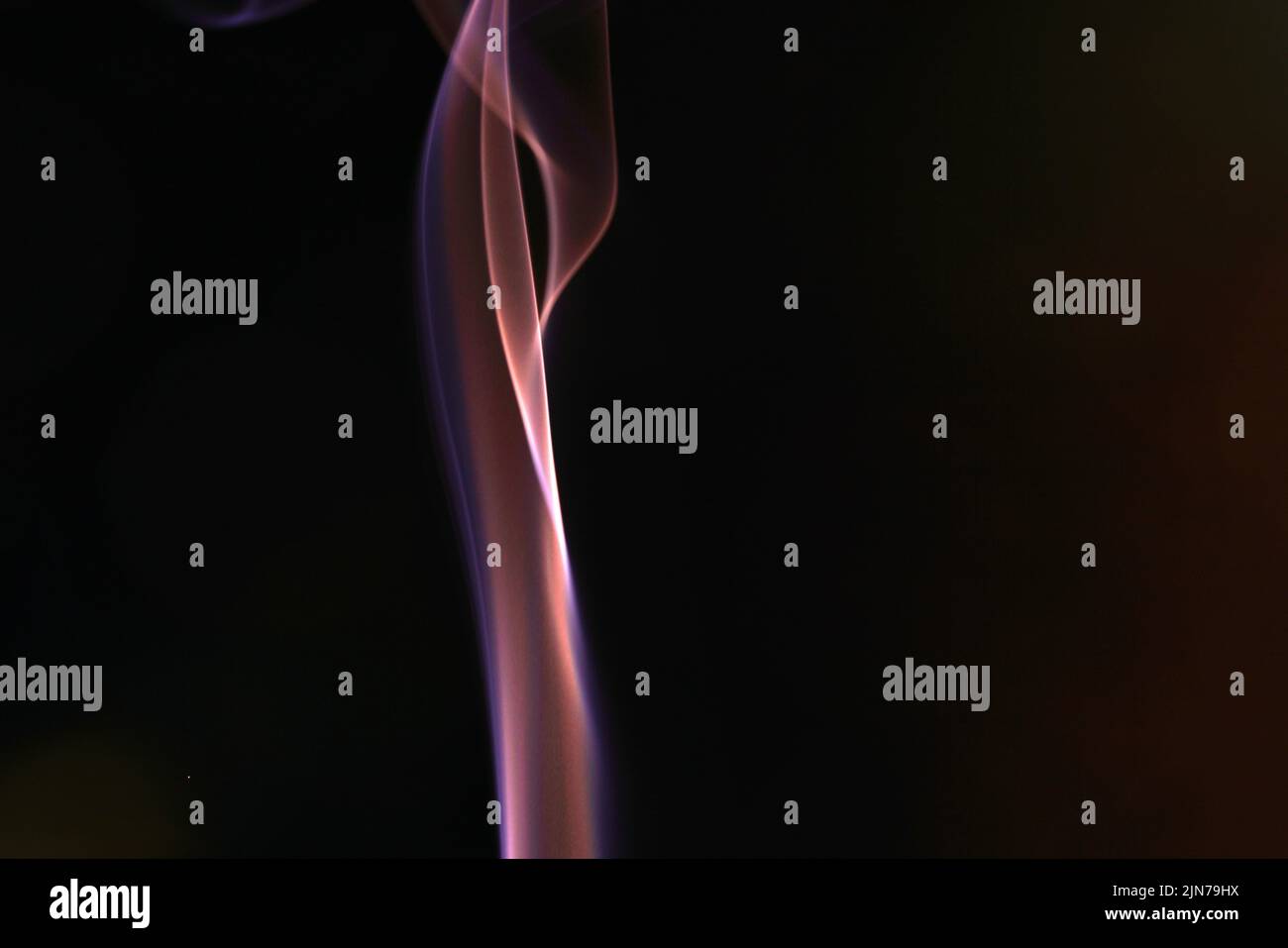 Smoke photographed in the studio with copy space and effect background ...