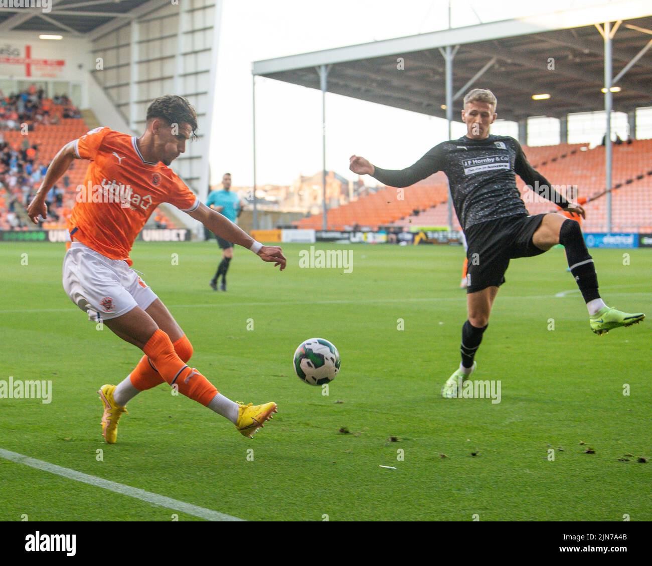 Theo Corbeanu #25 of Blackpool crosses the ball Stock Photo - Alamy