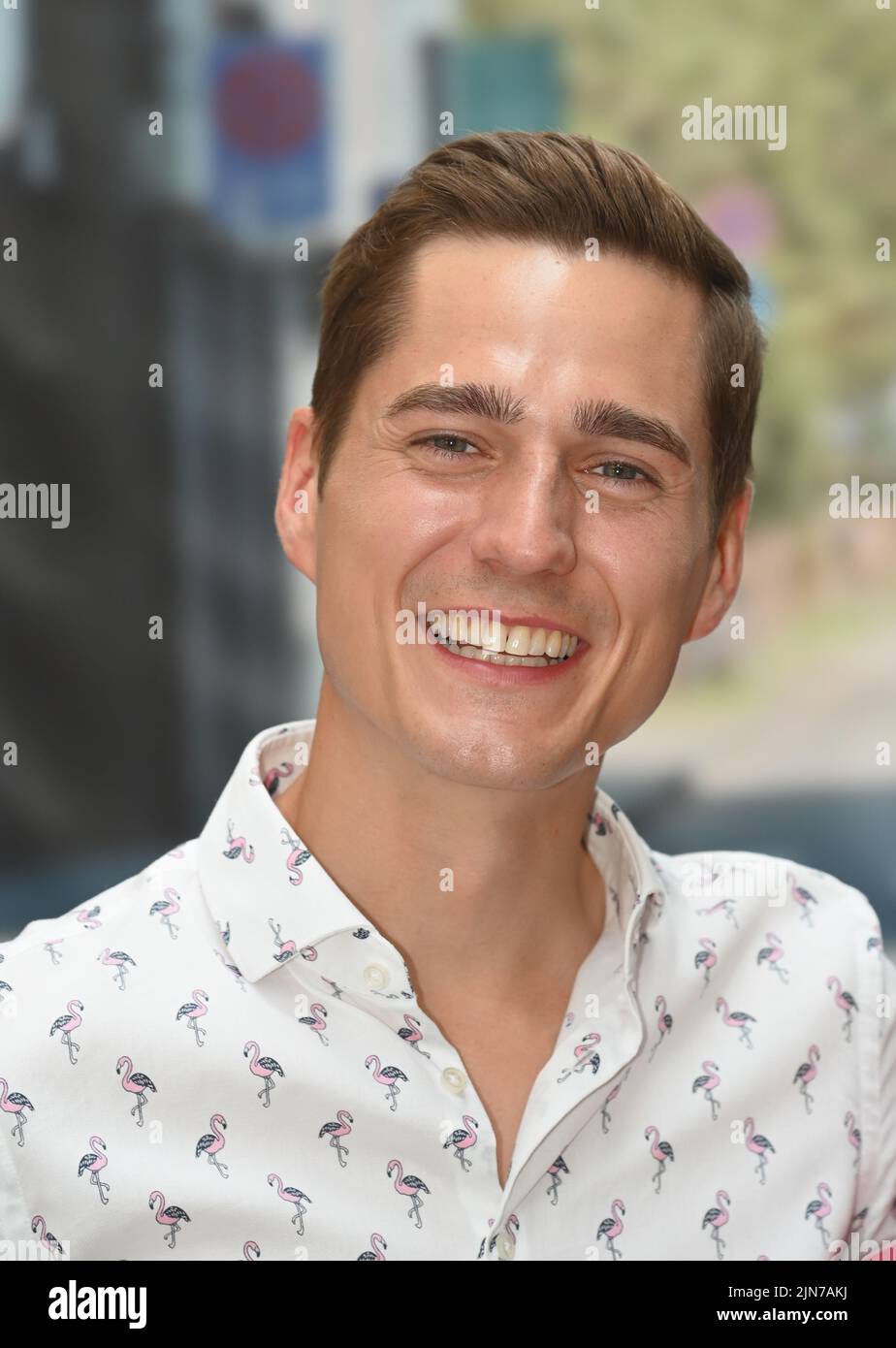 Cologne, Germany. 08th Aug, 2022. Actor Timothy Boldt poses at the big ...