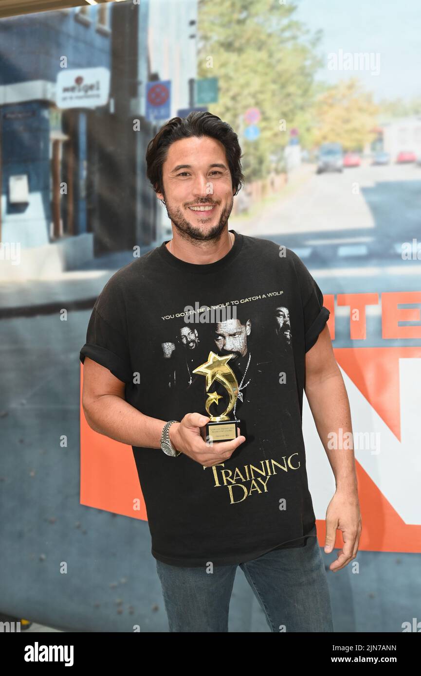 Cologne, Germany. 08th Aug, 2022. Actor Alexander Milo poses at the big ...