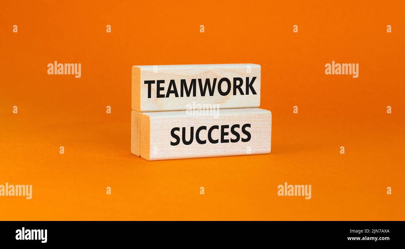 Teamwork success symbol. Concept words Teamwork success on wooden ...