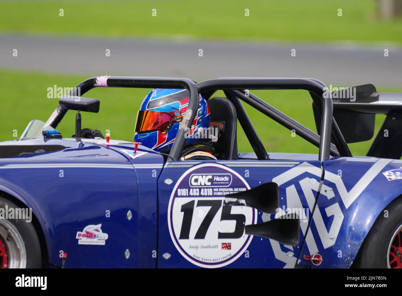 Croft, England, 6 August 2022. Andrew Southcott driving a MG Midget ...
