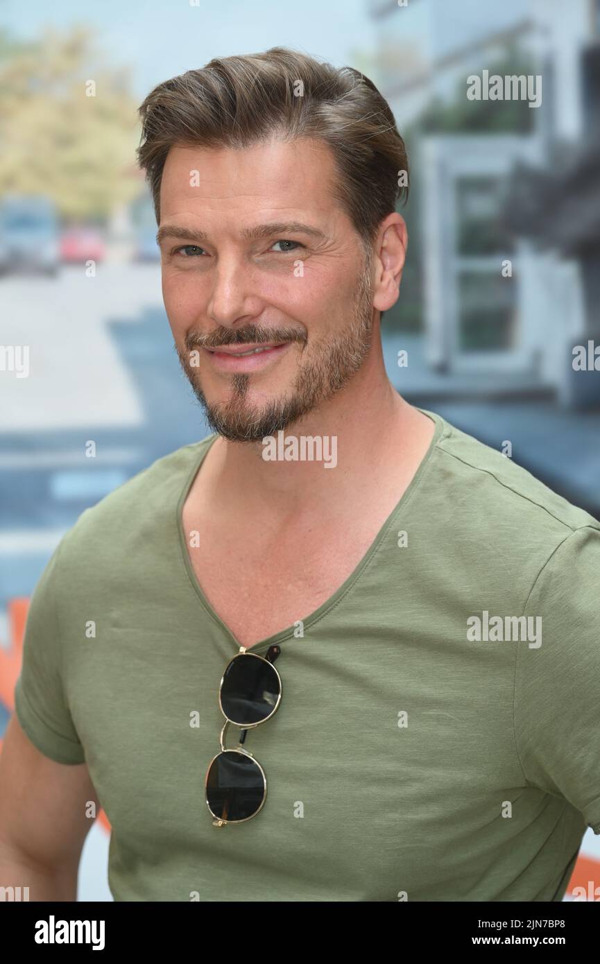 Cologne, Germany. 08th Aug, 2022. Actor Jan Ammann poses at the big fan meeting and award ...