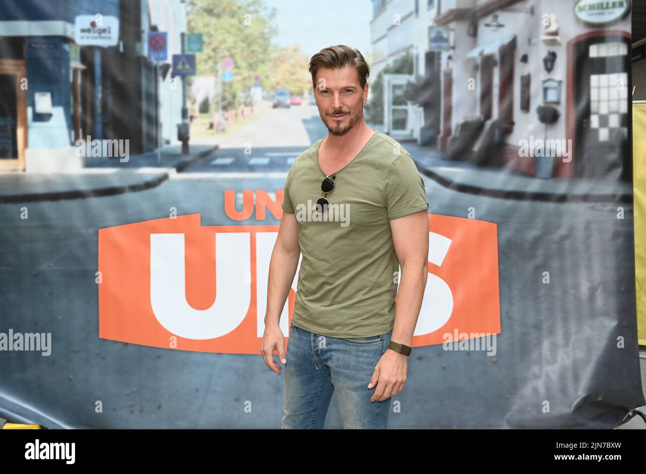Cologne, Germany. 08th Aug, 2022. Actor Jan Ammann poses at the big fan ...