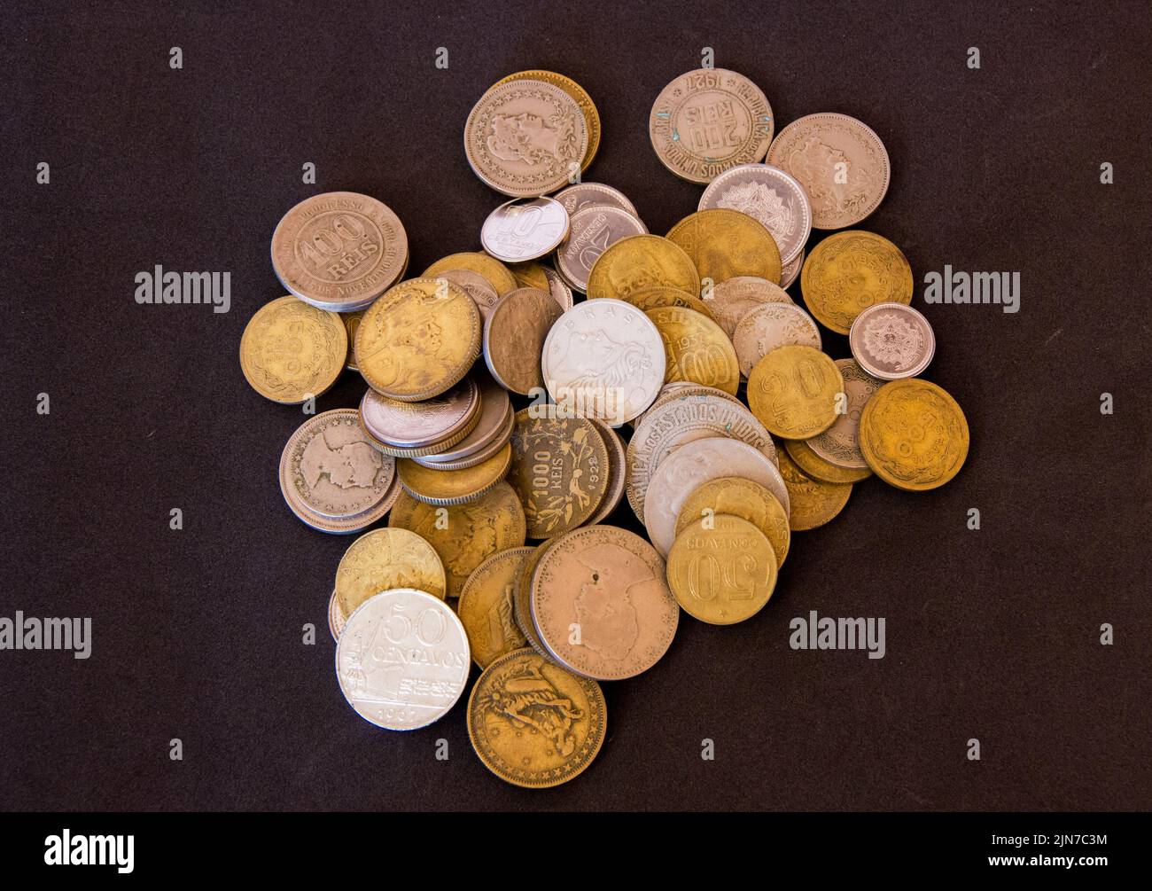 old coins reunited Stock Photo - Alamy