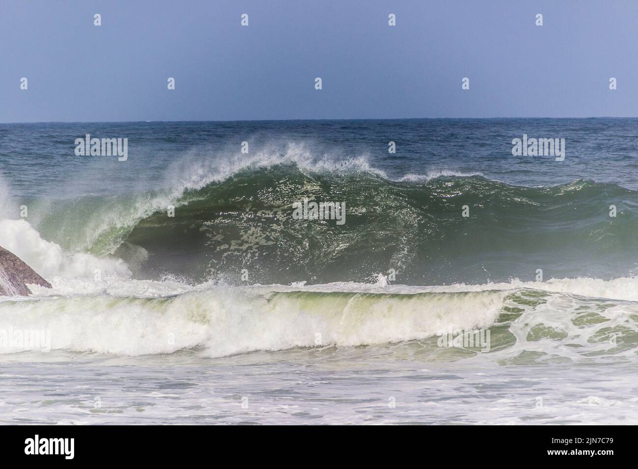 wave at arpoador beach in rio de janeiro Stock Photo - Alamy
