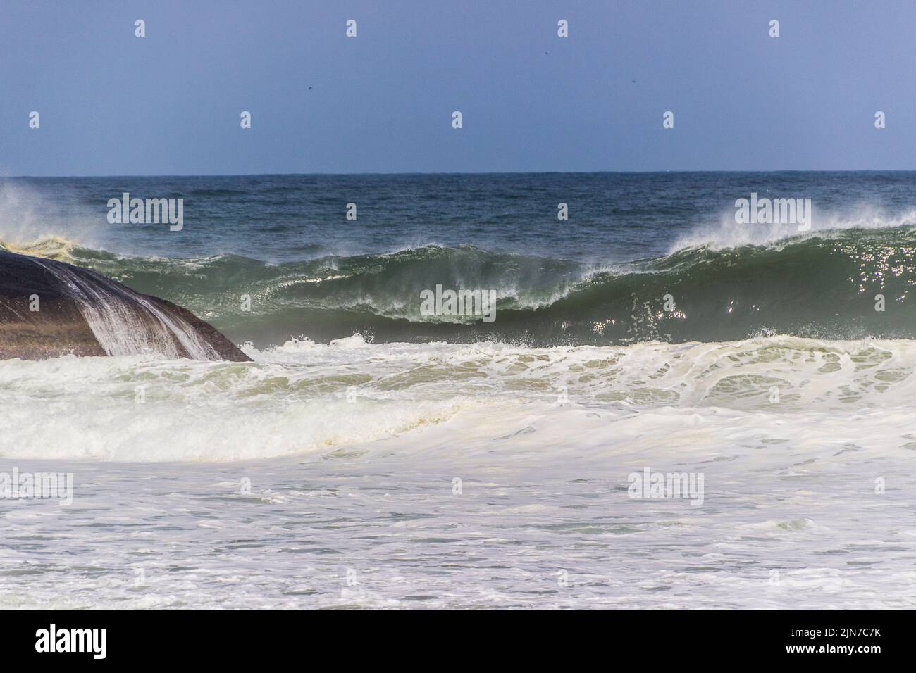 wave at arpoador beach in rio de janeiro Stock Photo - Alamy