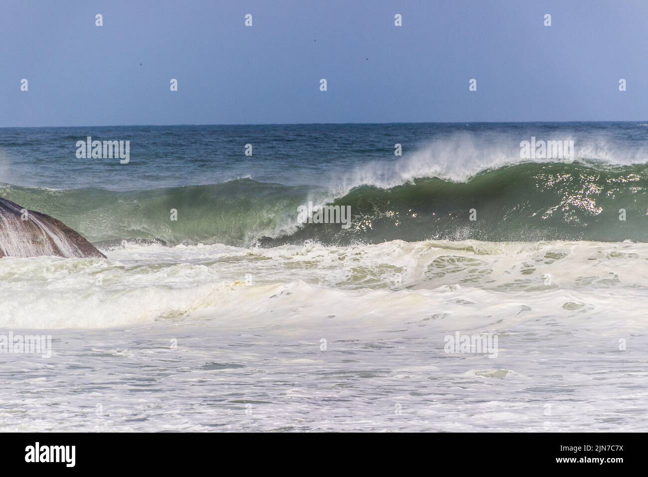 wave at arpoador beach in rio de janeiro Stock Photo - Alamy