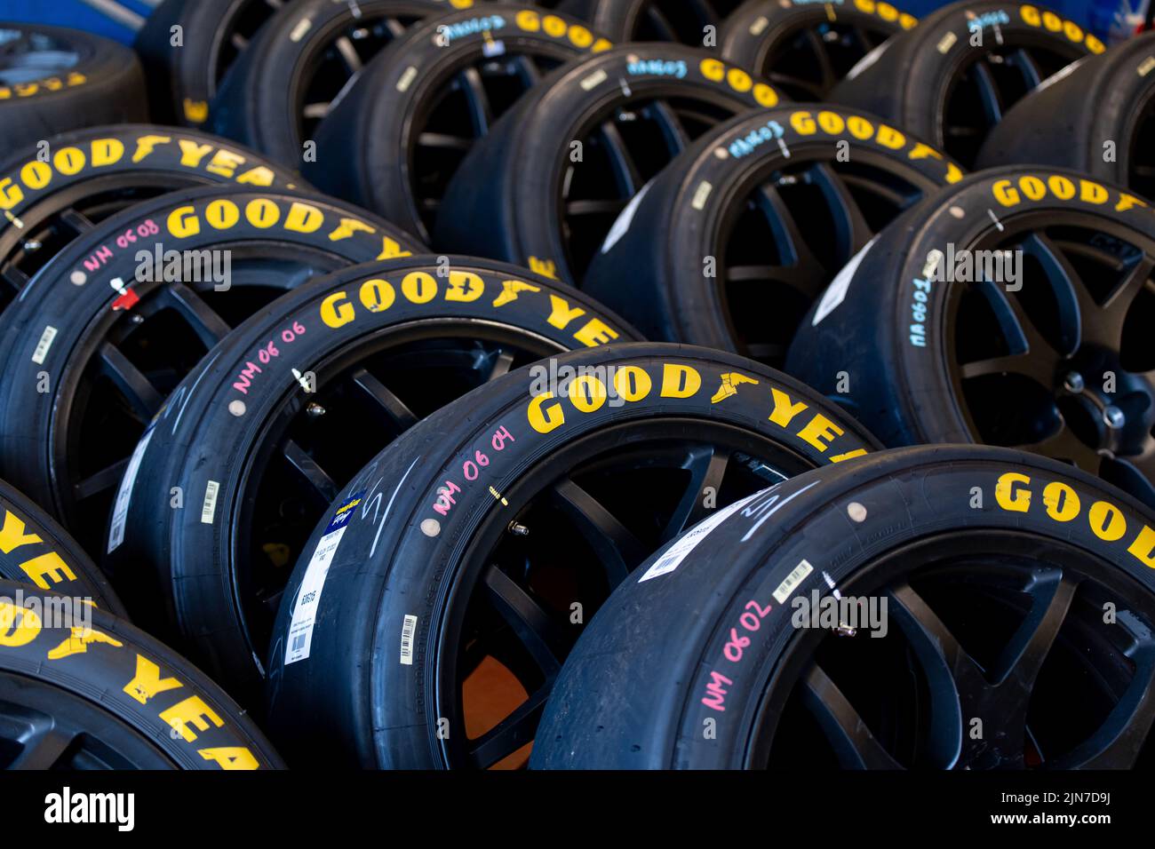Set of racing tires Goodyear label, full frame motor sport car ...