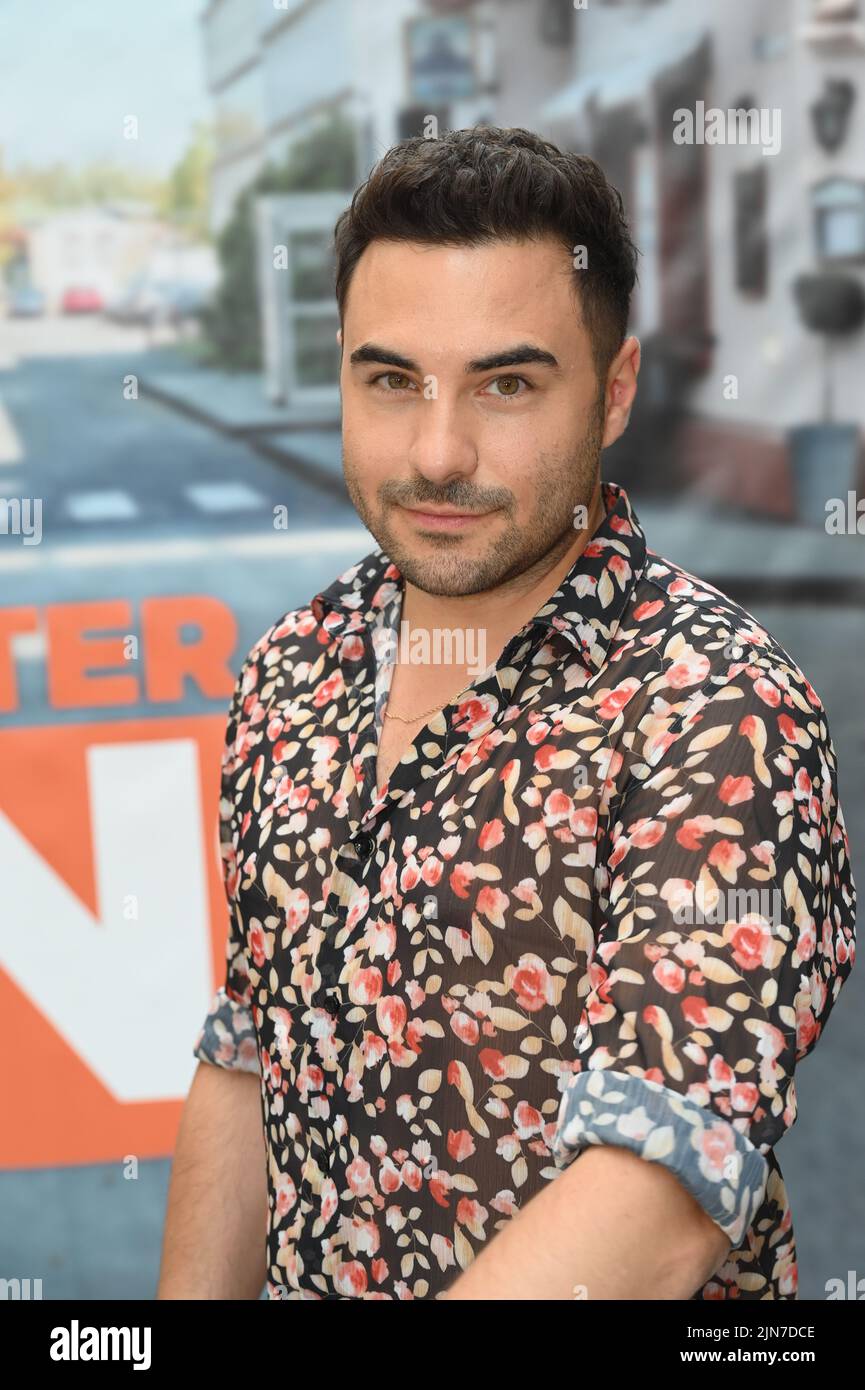 Cologne, Germany. 08th Aug, 2022. Actor Lars Steinhöfel poses at the ...