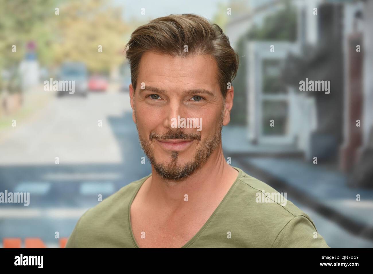 Cologne, Germany. 08th Aug, 2022. Actor Jan Ammann poses at the big fan ...