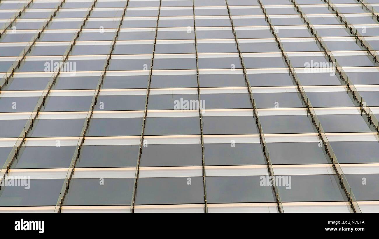 Panorama Tinted glass curtain wall of a building with vertical glass ...