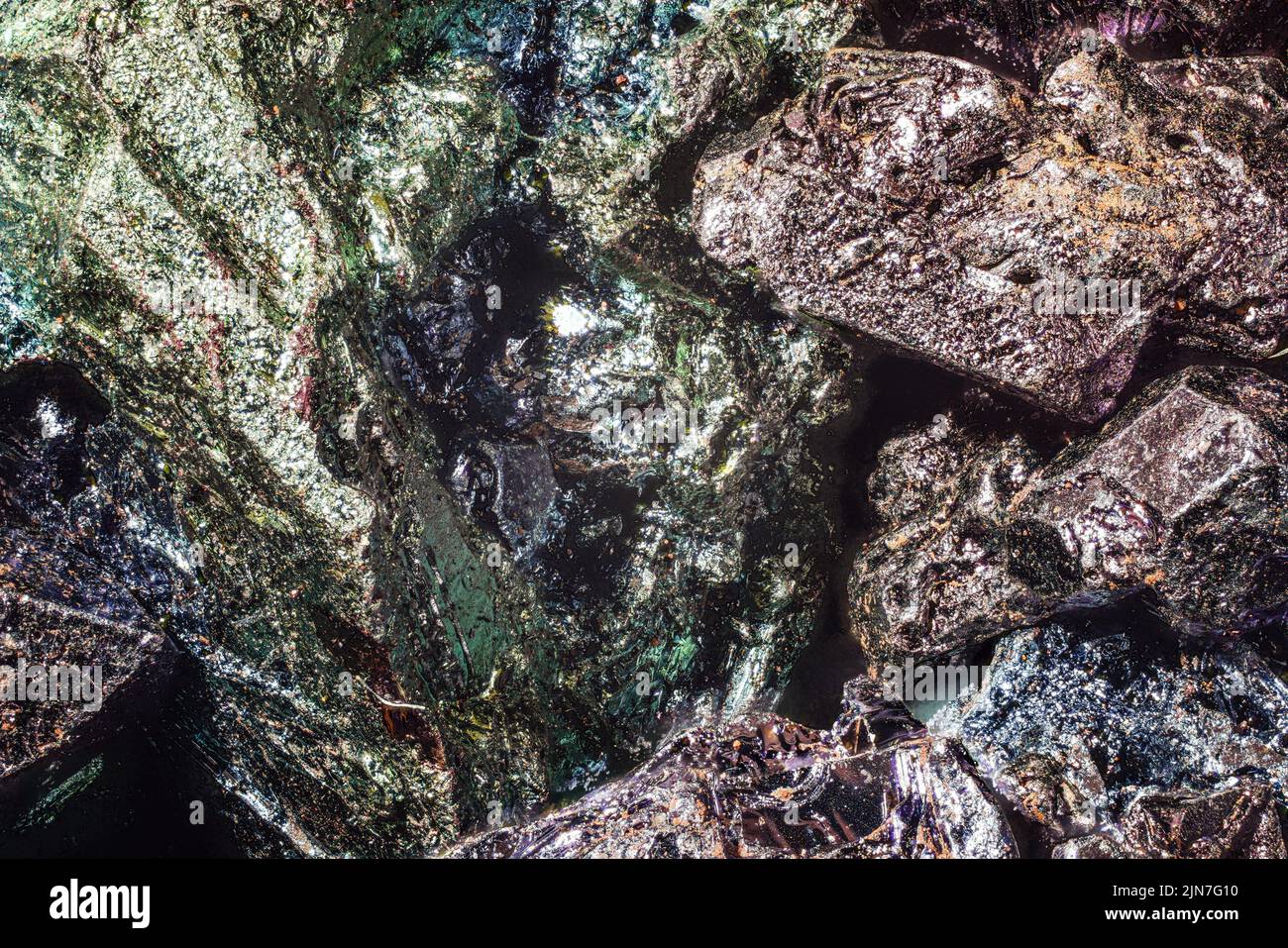 Potassium permanganate crystals under 4x magnification microscope ...