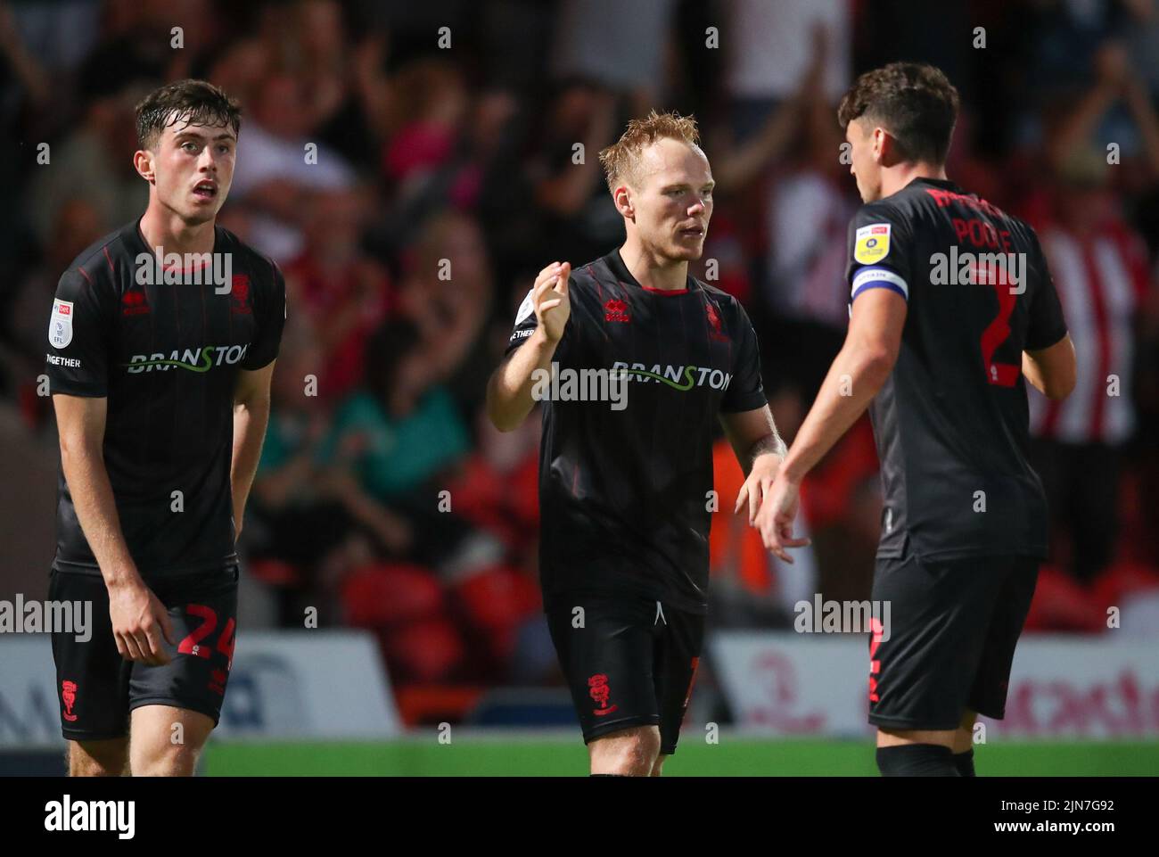 Lincoln City's Anthony Scully celebrates scoring their side's second ...