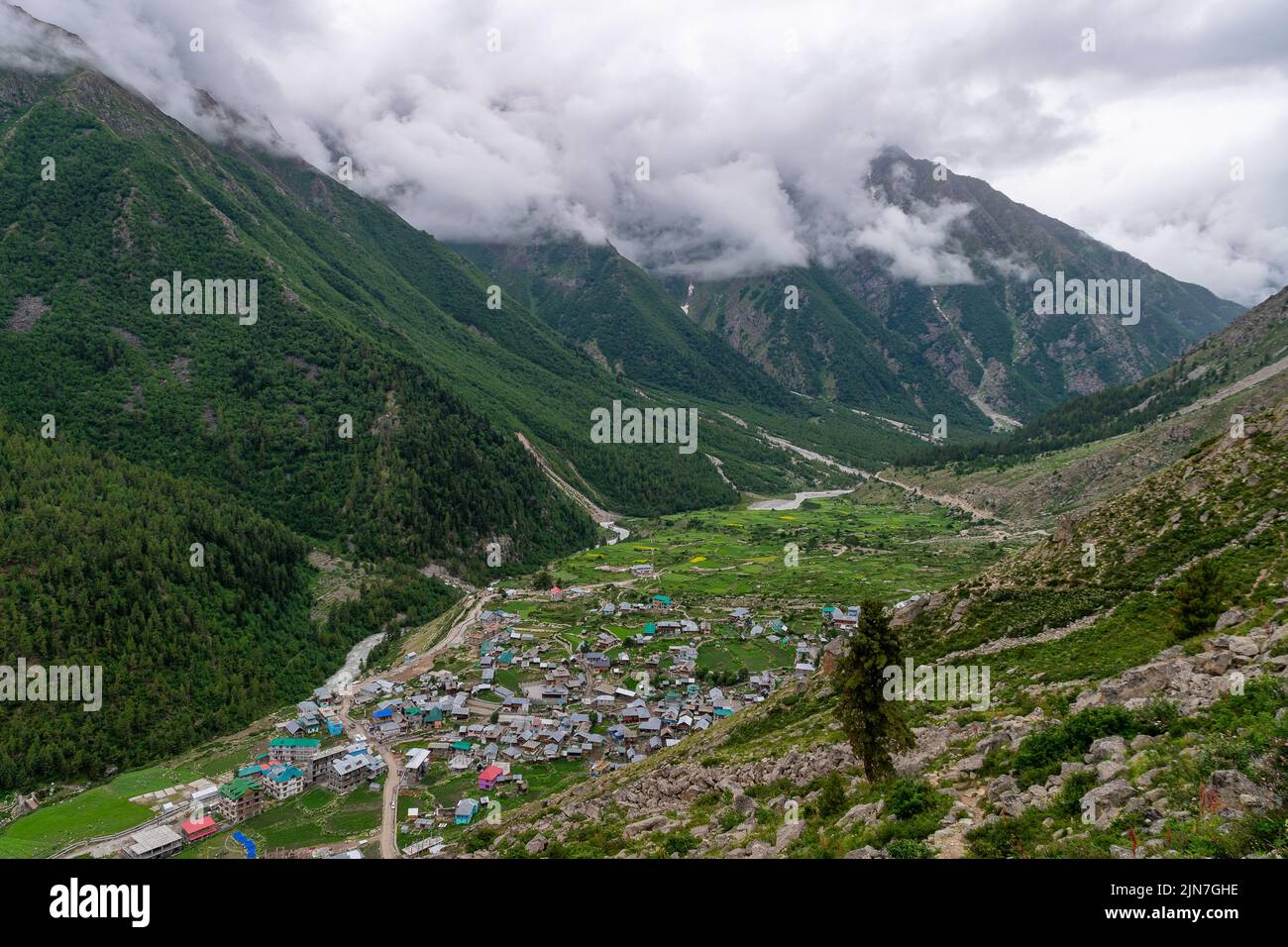 A scenic view of the Chitkul village with buildings, Sangla Valley ...