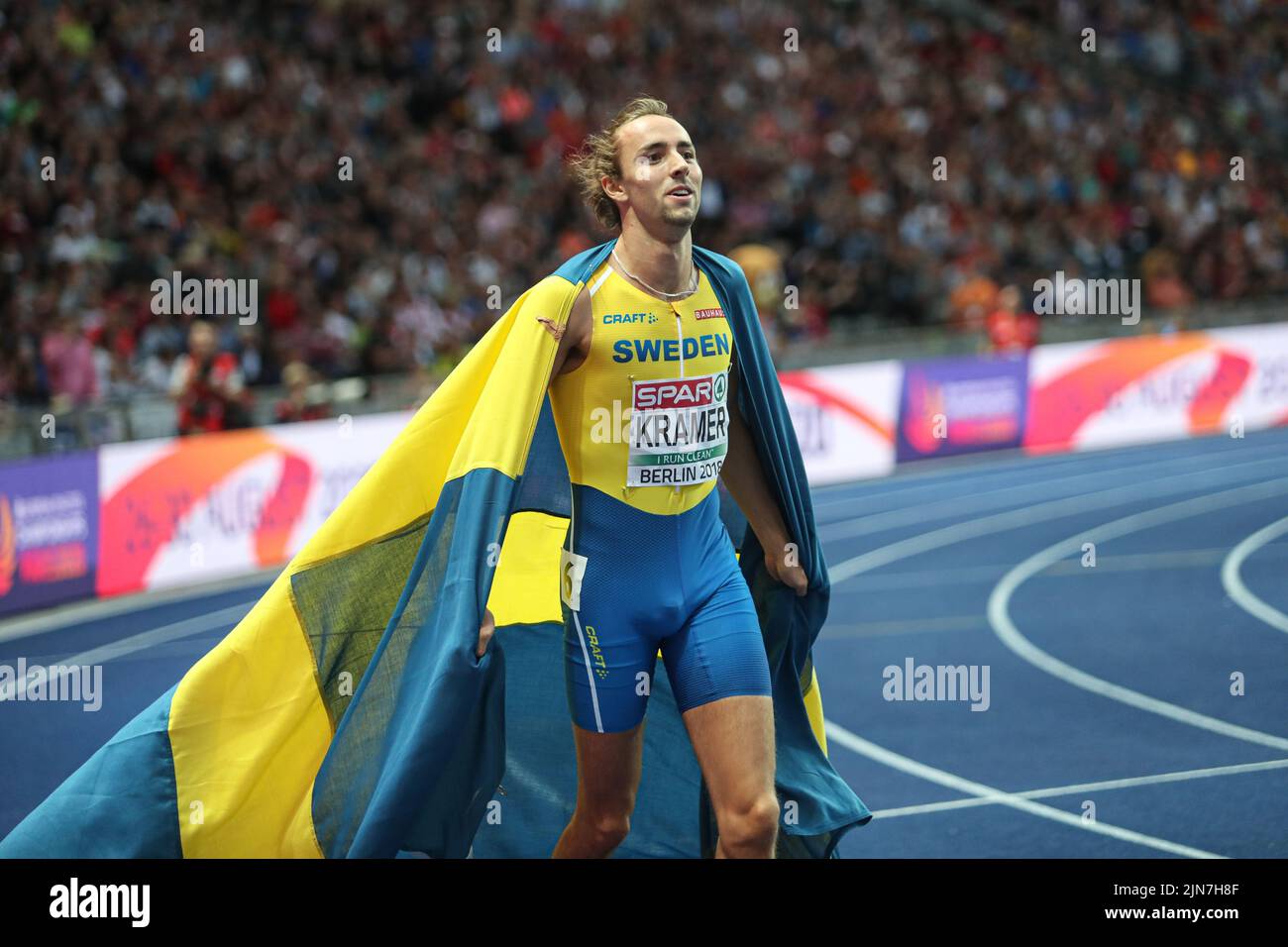 Andreas Kramer with the flag of his country at the European Athletics Championships in Berlin ...