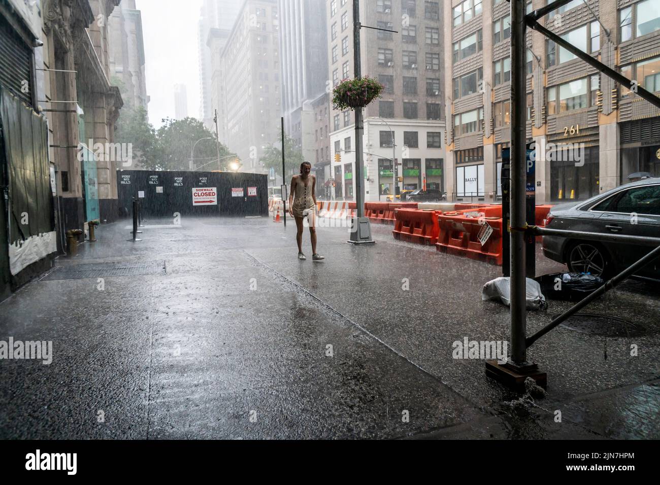 People contend with a torrential downpour in the NoMad neighborhood of ...
