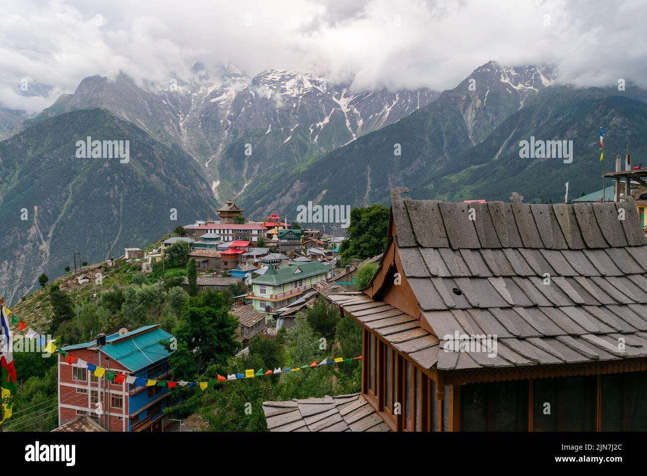 A beautiful shot of the Kalpa village with colorful buildings and ...