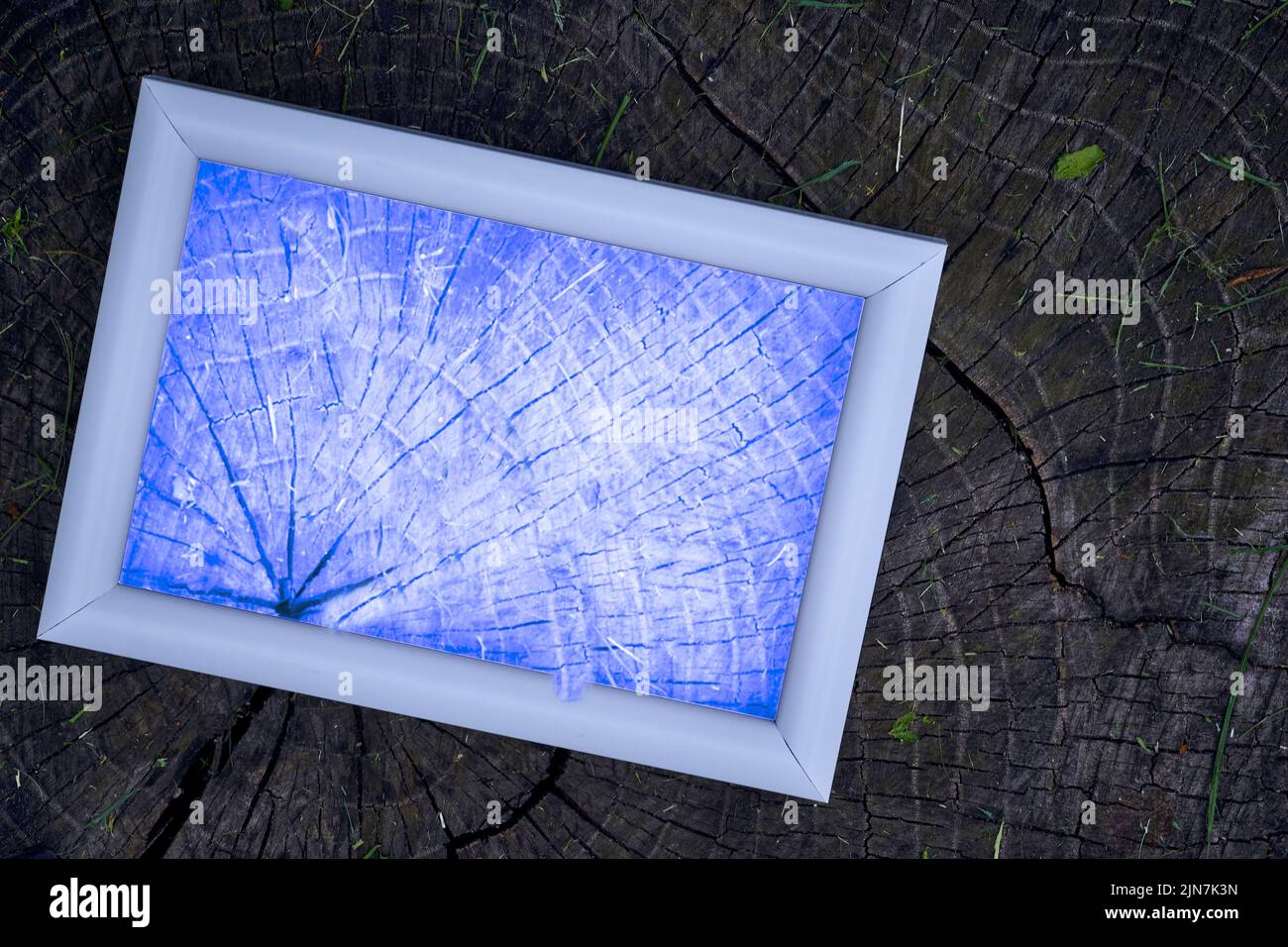 Blue matte neon and brown wooden texture frame for text Stock Photo - Alamy