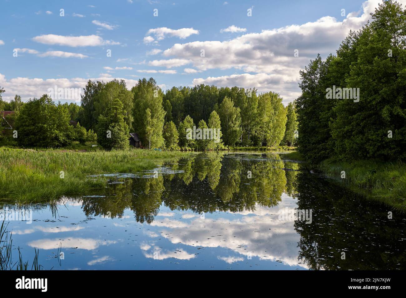 Beautiful summer landscape of river at sunny day with sky and clouds ...