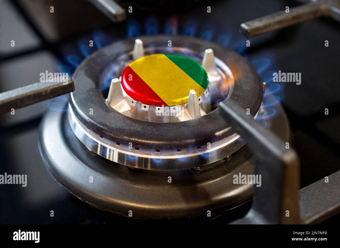 Gas import and export concept. A burning gas burner of a home stove, in ...
