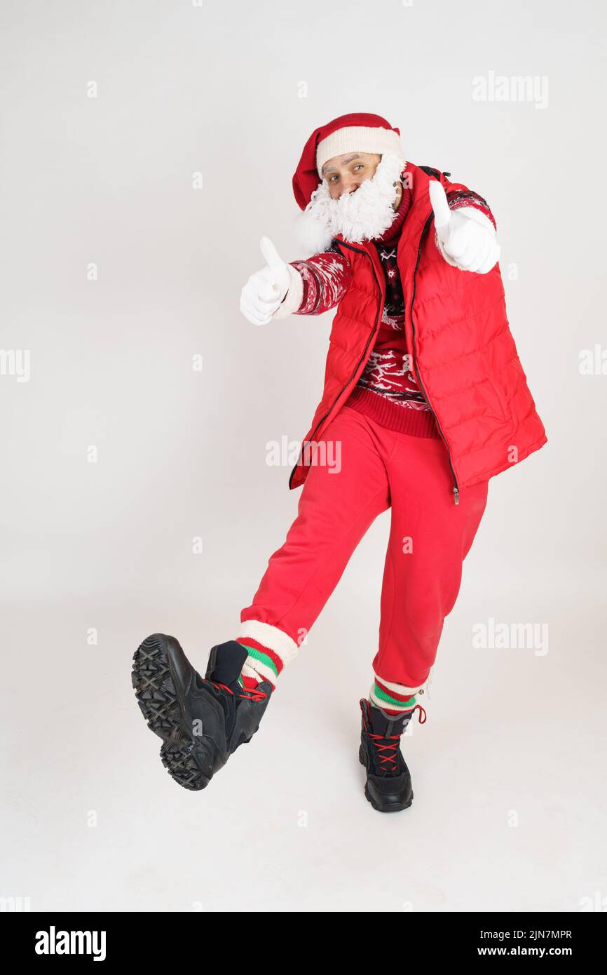 Christmas and New Years concept. Santa Claus shows with two hands a ...