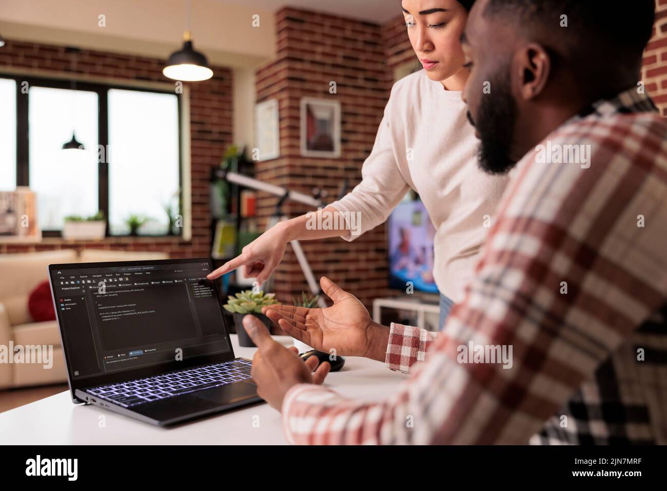 Programmers Couple Coding Security Firewall On Laptop Using Html And Temrinal Window To Develop