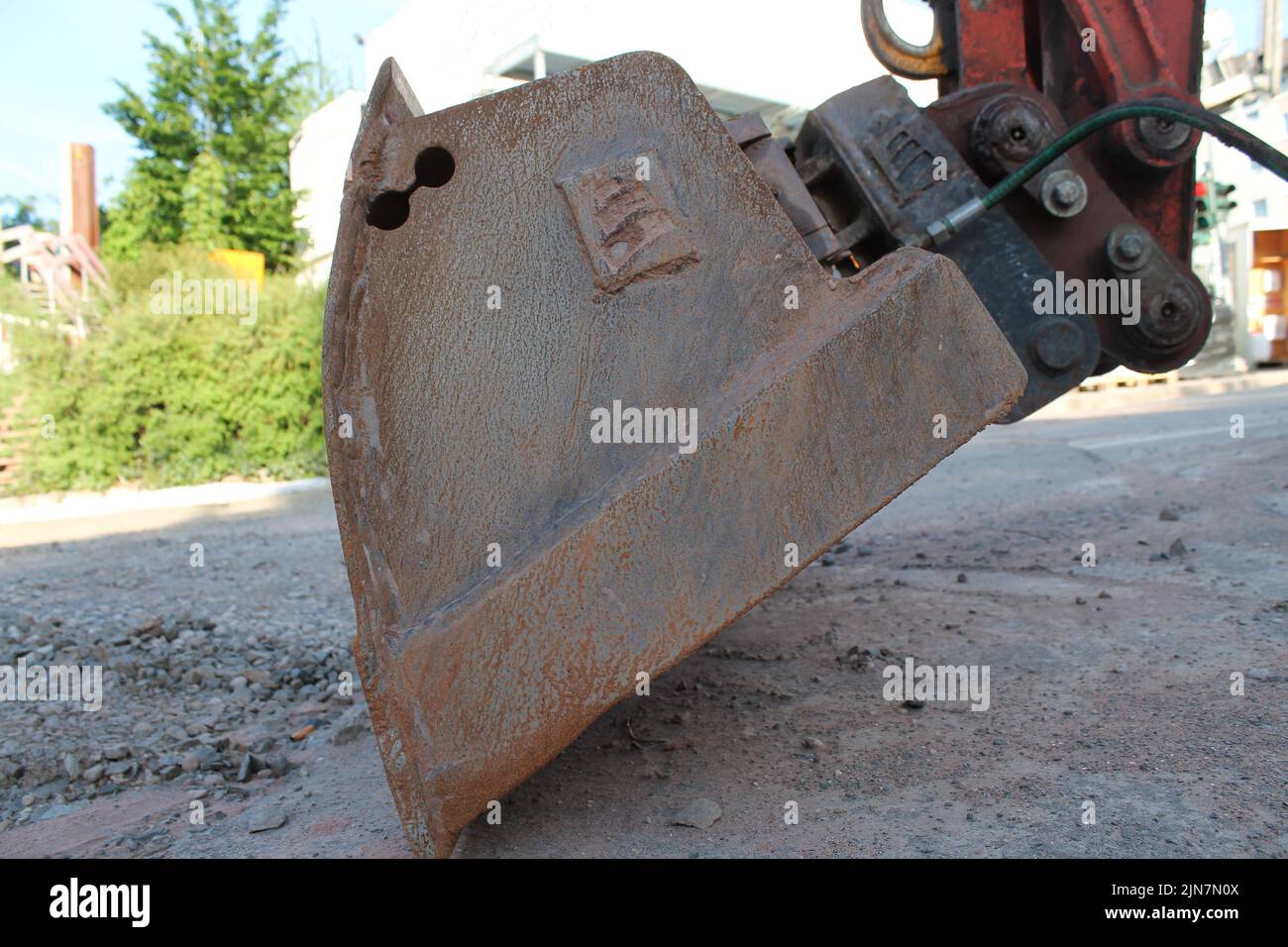 A closeup of a rusty digging bucket on a ground Stock Photo - Alamy