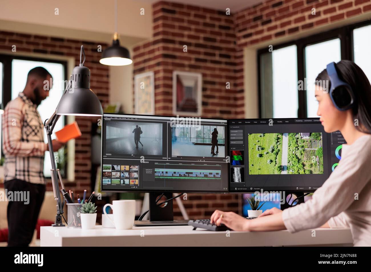 Asian video editor working with multimedia footage, editing film ... Asian video editor working with multimedia footage, editing film ...