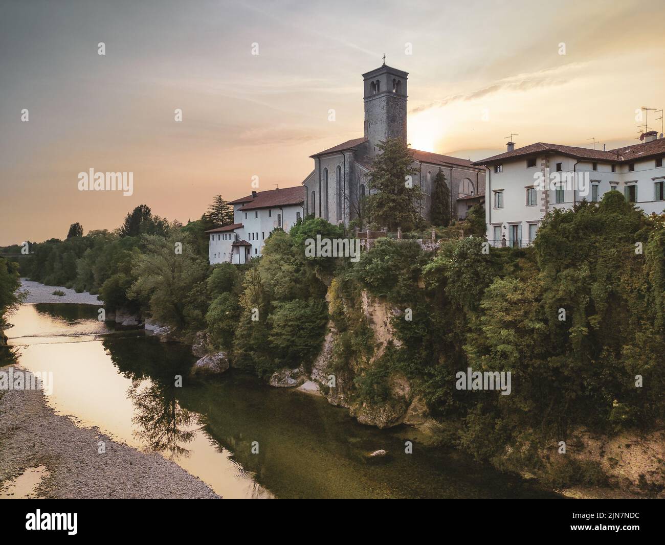 A picturesque view of Oratorio di Santa Maria temple and Natisone river ...