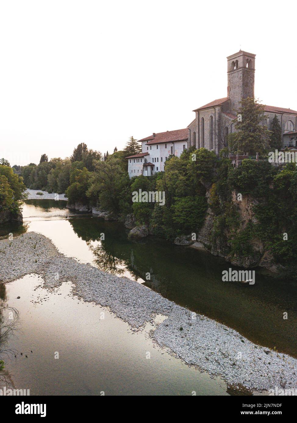 A picturesque view of Oratorio di Santa Maria temple and Natisone river ...