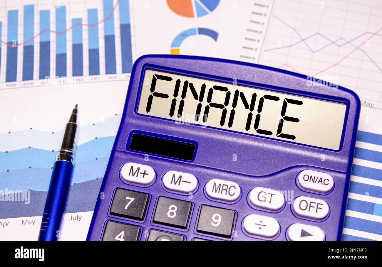 Finance word built with letter cubes Stock Photo - Alamy