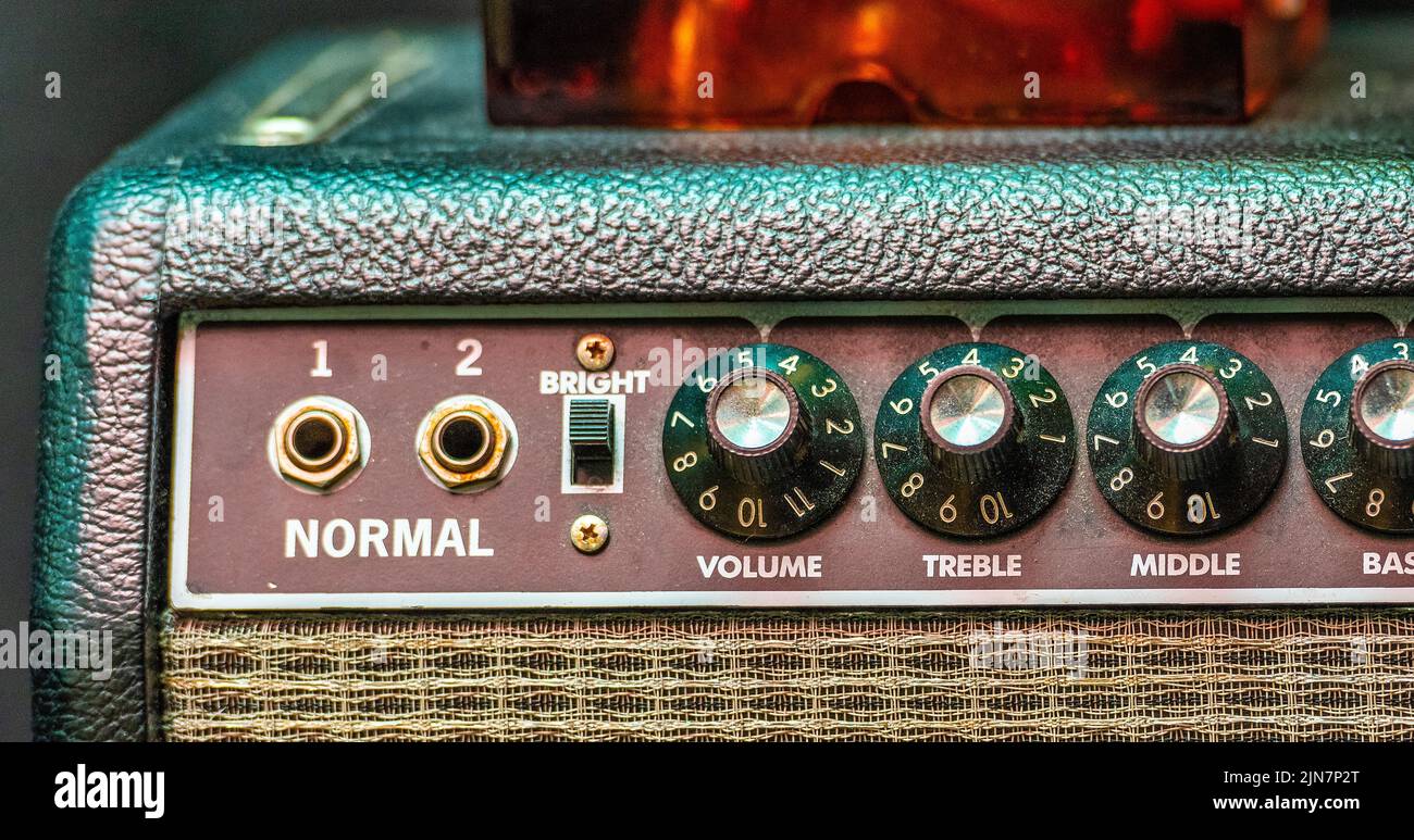 A close-up shot of an old vintage amp where the volume goes to 11 Stock ...
