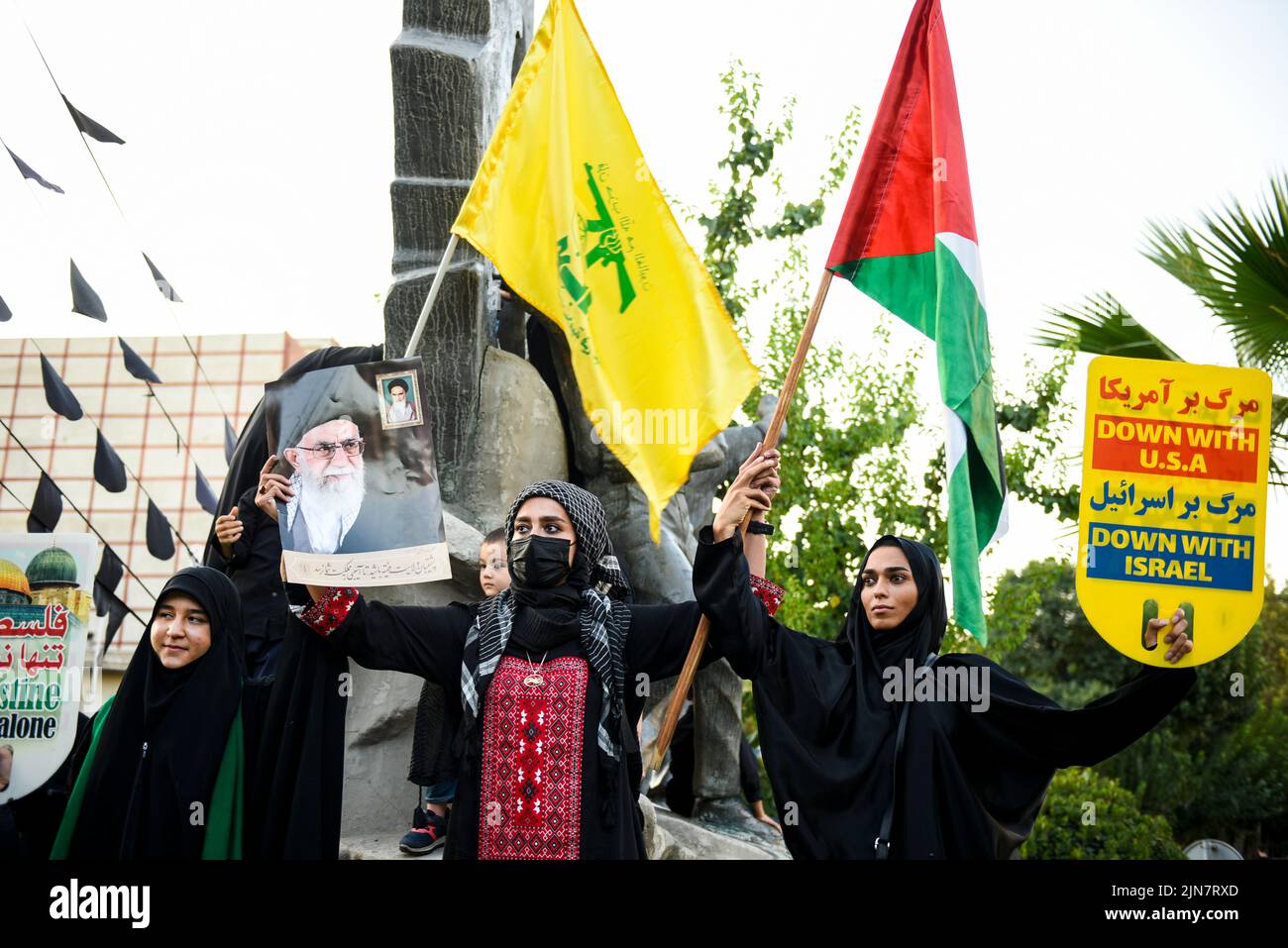 Tehran, Iran. 09th Aug, 2022. Demonstrators hold the Palestine and ...