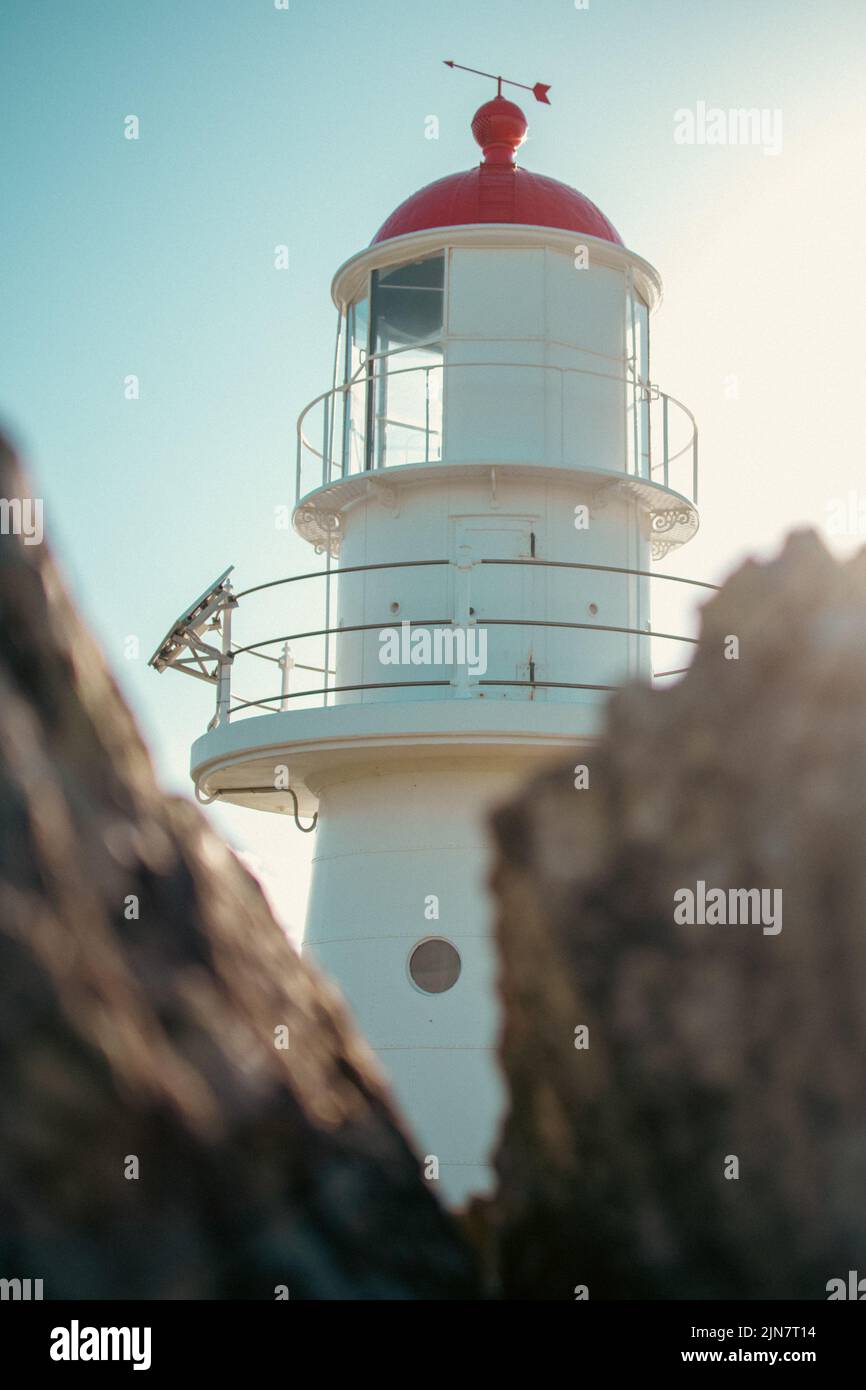 A vertical shot of the Double Island Point Lighthouse, Queensland Stock ...
