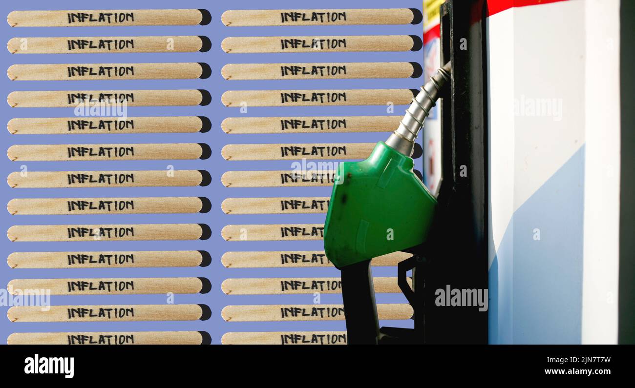 Close up of gasoline fuel nozzle in petrol station. Inflation and ...
