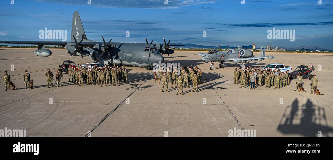 Members of the 355th Security Forces Squadron pose for a group photo at ...