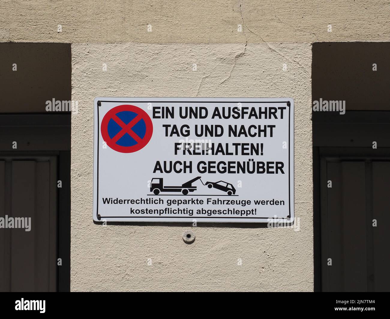 German no parking sign Ein und Ausfahrt Tag und Nacht freihailten auch ...