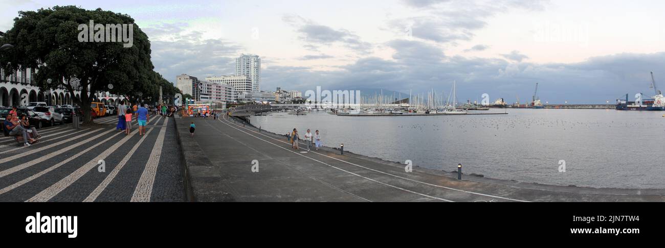 Costal part of the town facing the harbor, view at sunset hour ...