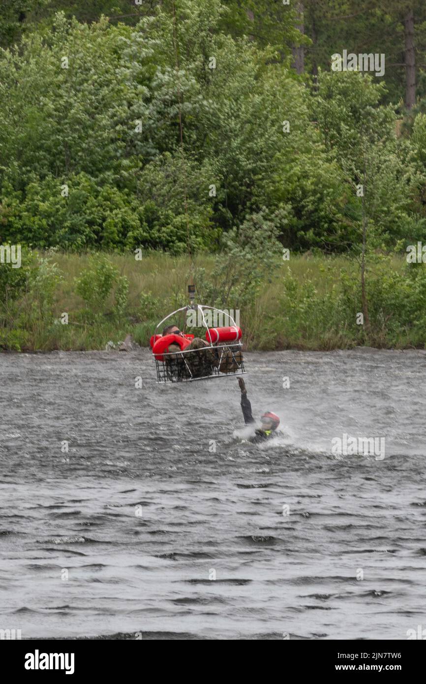 UH-60 Black Hawk hoist training at Fort McCoy's Big Sandy Lake Soldiers ...