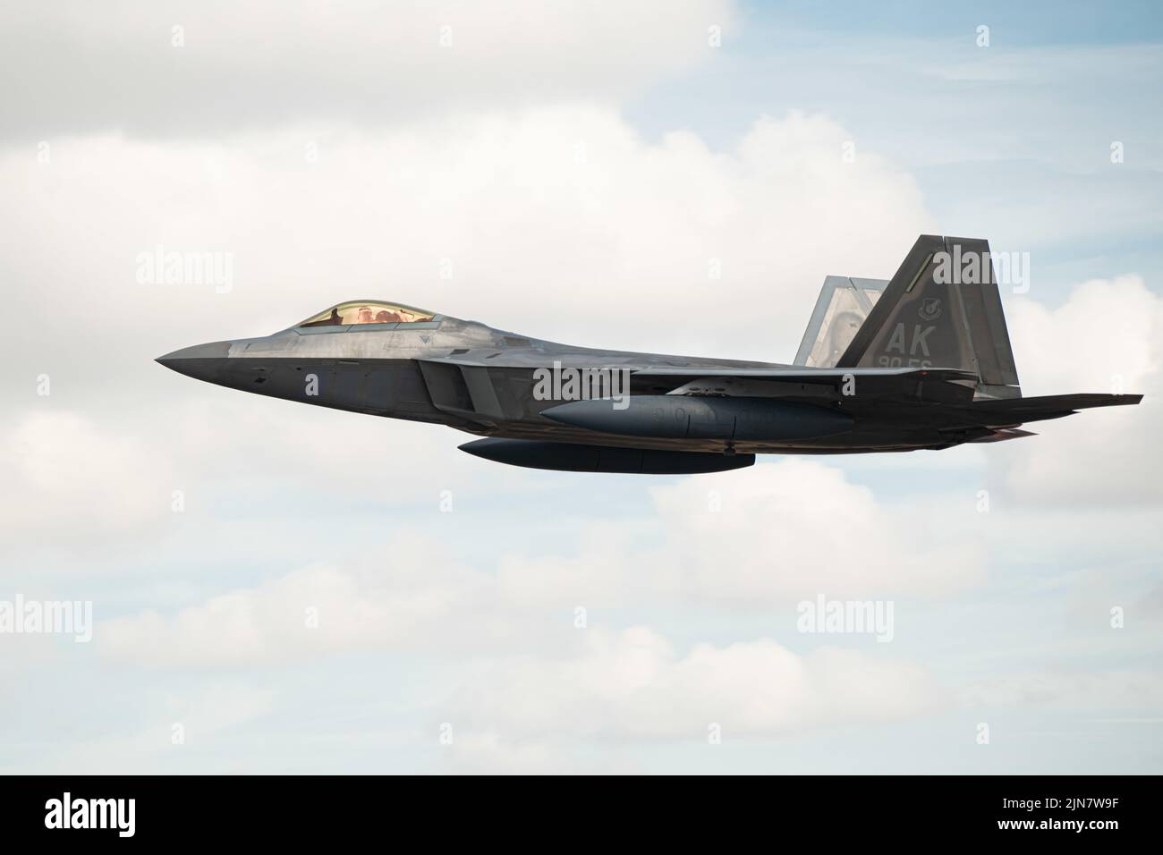 An F-22 Raptor assigned to the 90th Fighter Squadron, 3rd Wing ...