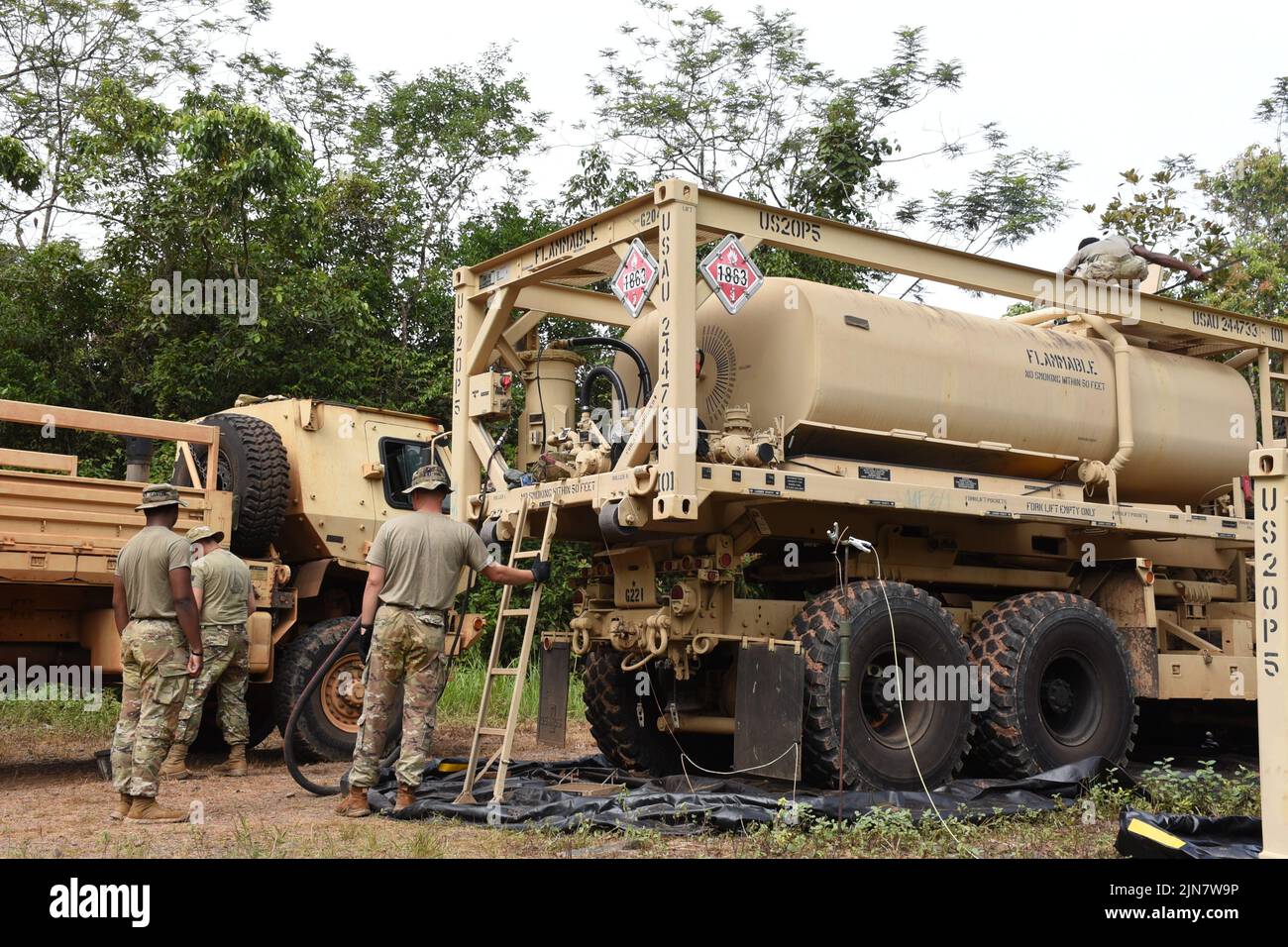 U.S. Army soldiers from 3rd Brigade IBCT fuel their Multipurpose Troop ...