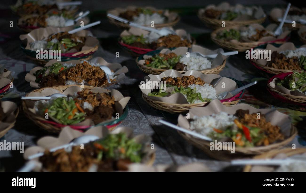 A dining table full of plates with the same meal Stock Photo - Alamy