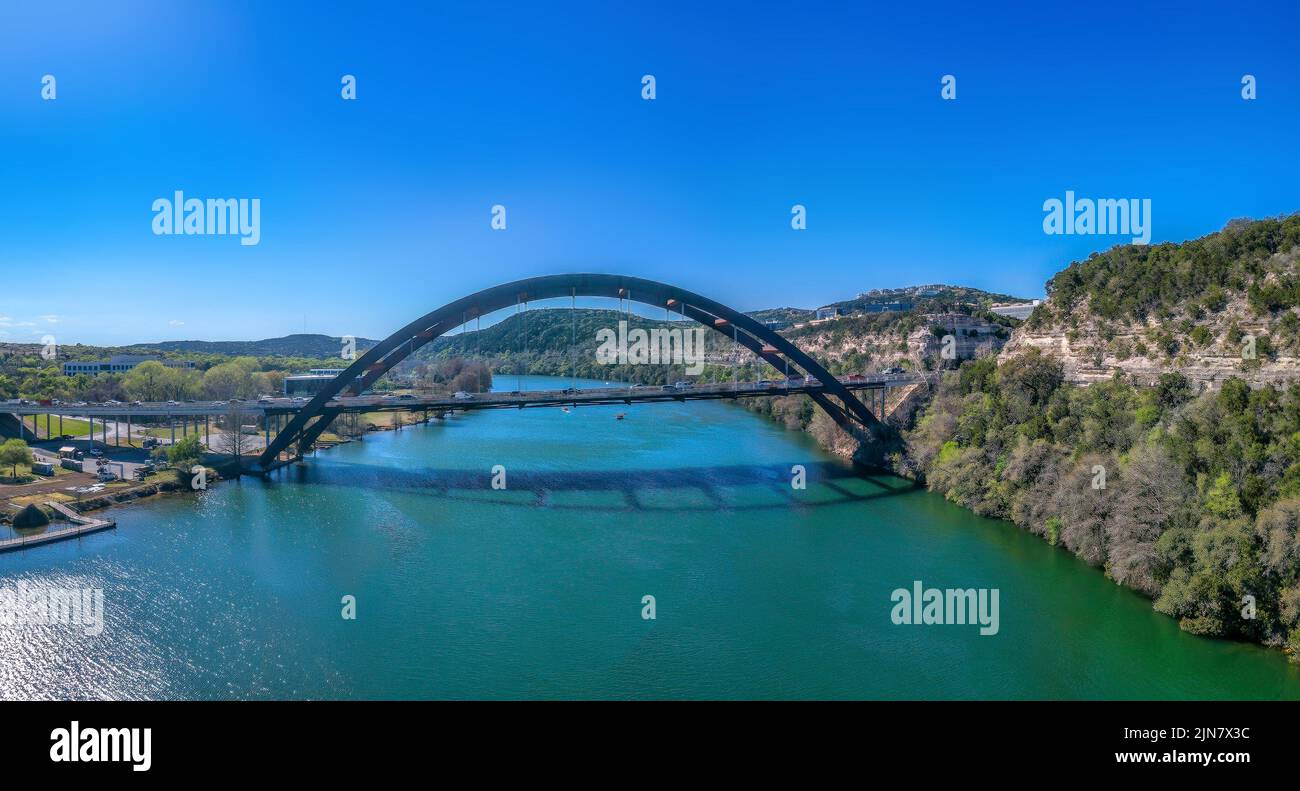 Austin, Texas- Through arch bridge and Colorado River. Bridge ...