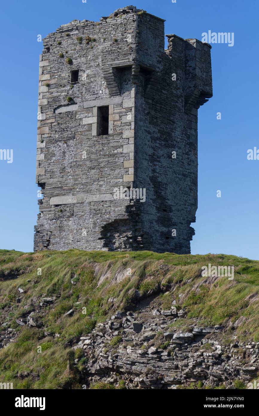 a vertical shot of Moher Tower on Hag's Head in Cliffs of Moher in ...