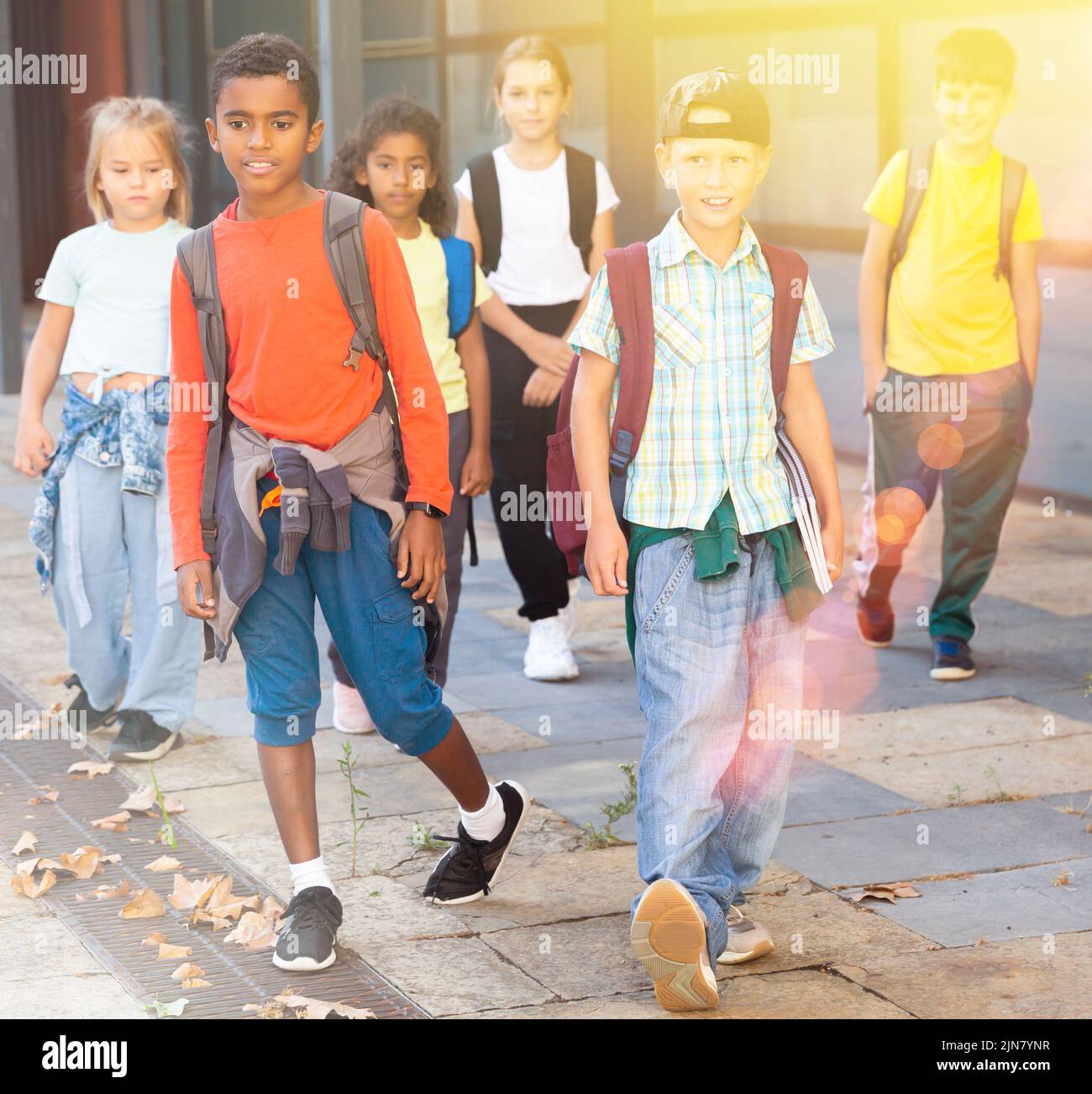 Child girl walking school bag hi-res stock photography and images - Alamy