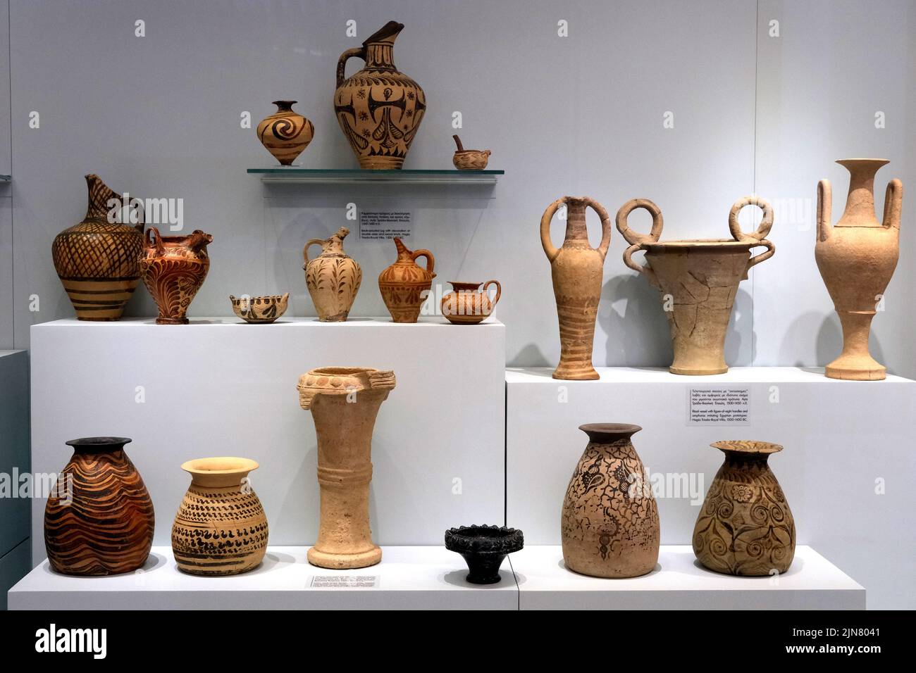 Various pottery and cups in the Heraklion Archaeological Museum in ...