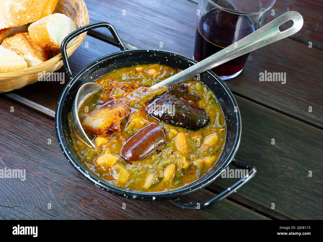 Pottage with sausage, potato and beans Stock Photo - Alamy