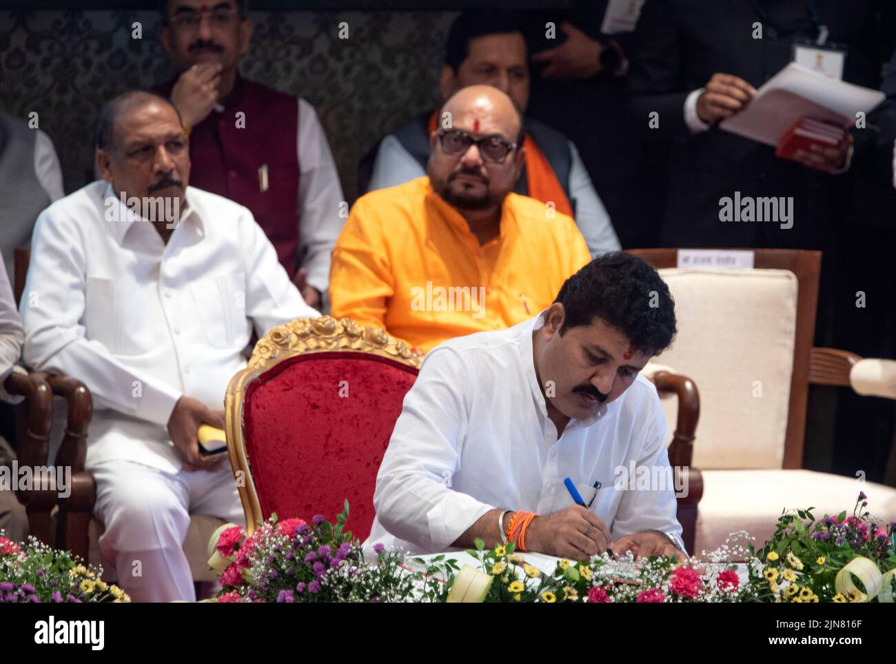MUMBAI, INDIA - AUGUST 9: Shiv Sena leader Sanjay Rathod signing after ...