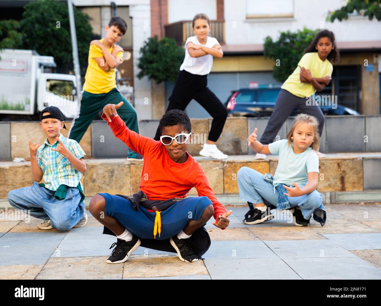 Kids training hip hop on city street Stock Photo - Alamy